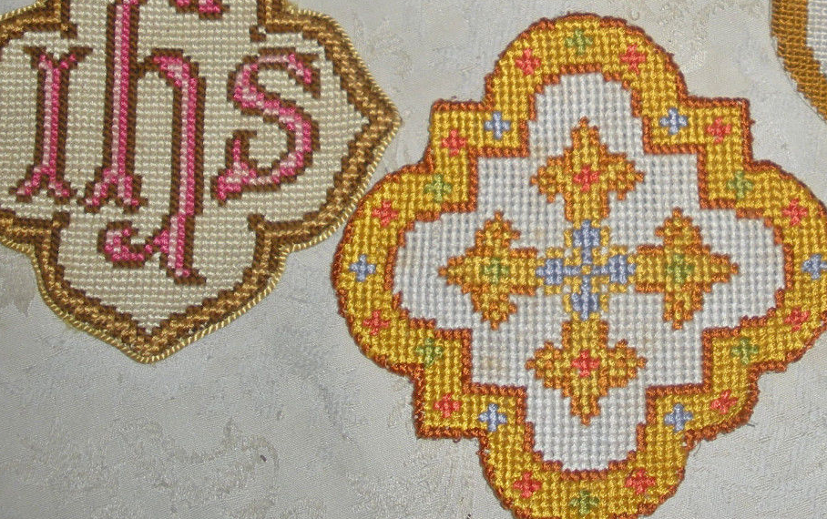 Four embroidered religious motifs